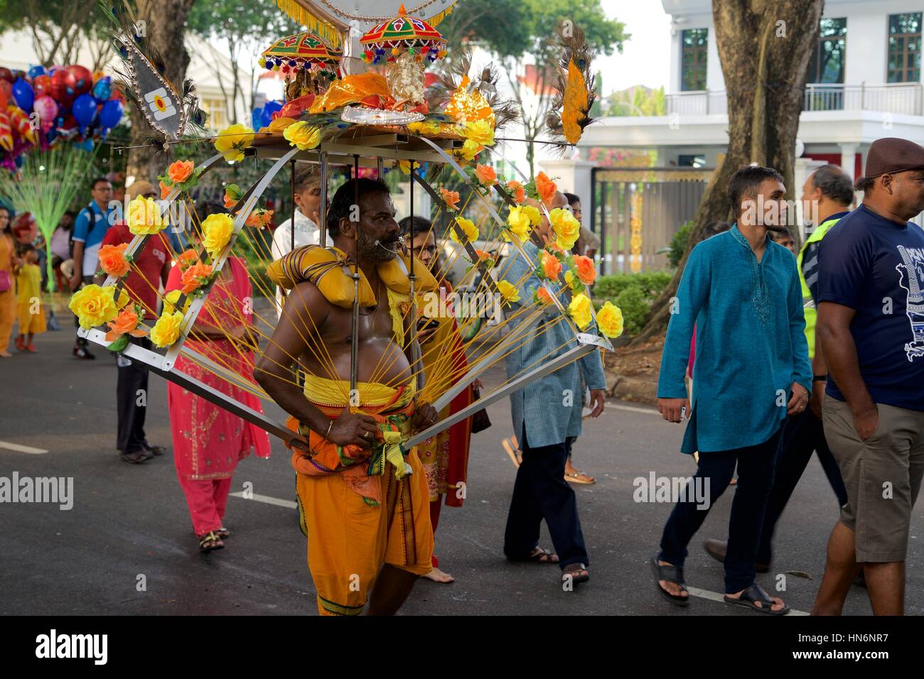 Thaipusam celebration in Penang. Devotees performing kavadi attam ...
