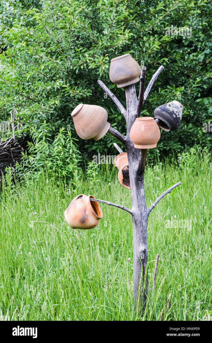 Hanging clay pots hi-res stock photography and images - Alamy
