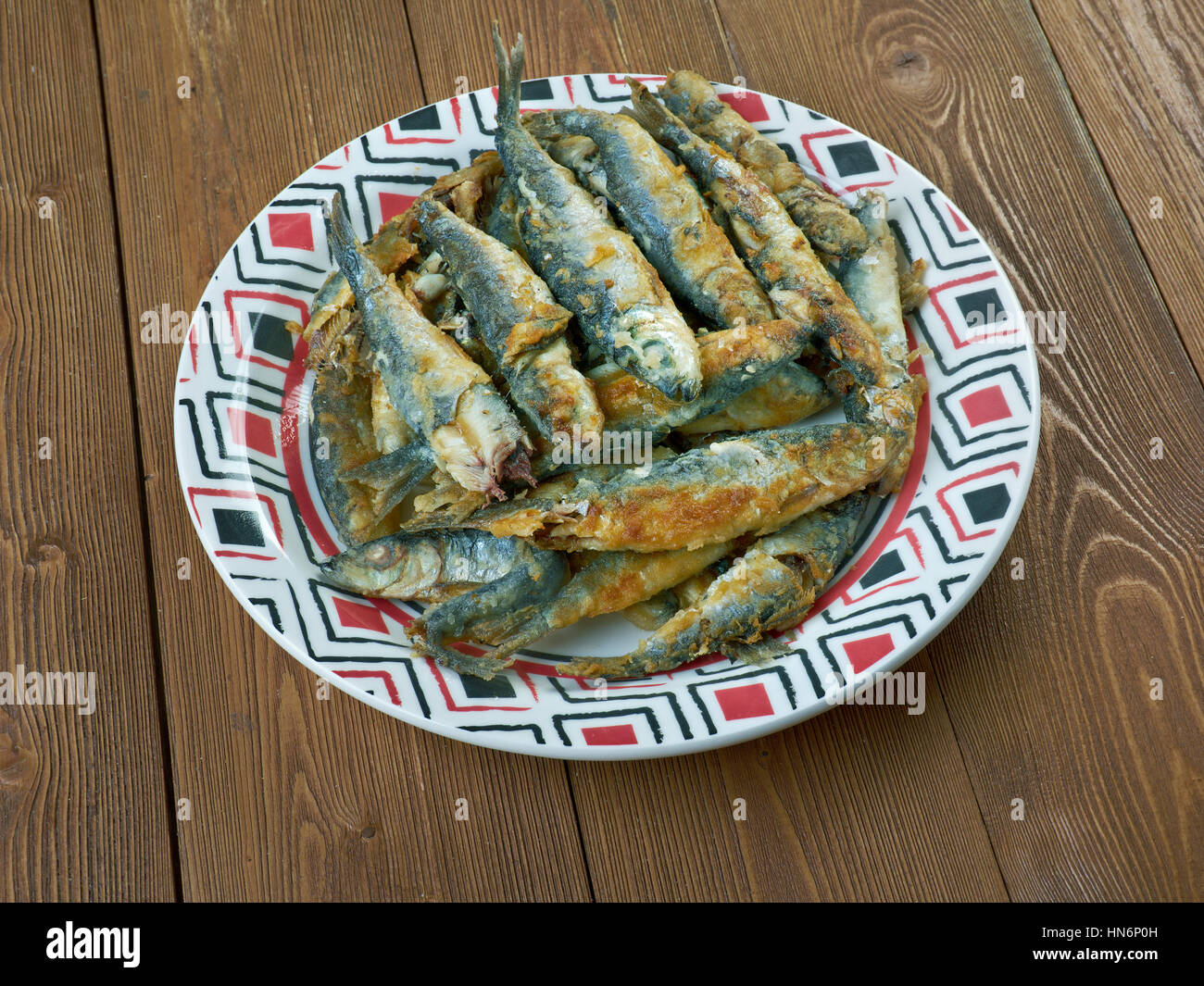 paistetut muikut Finnish dish of fried vendace in oil Stock Photo - Alamy