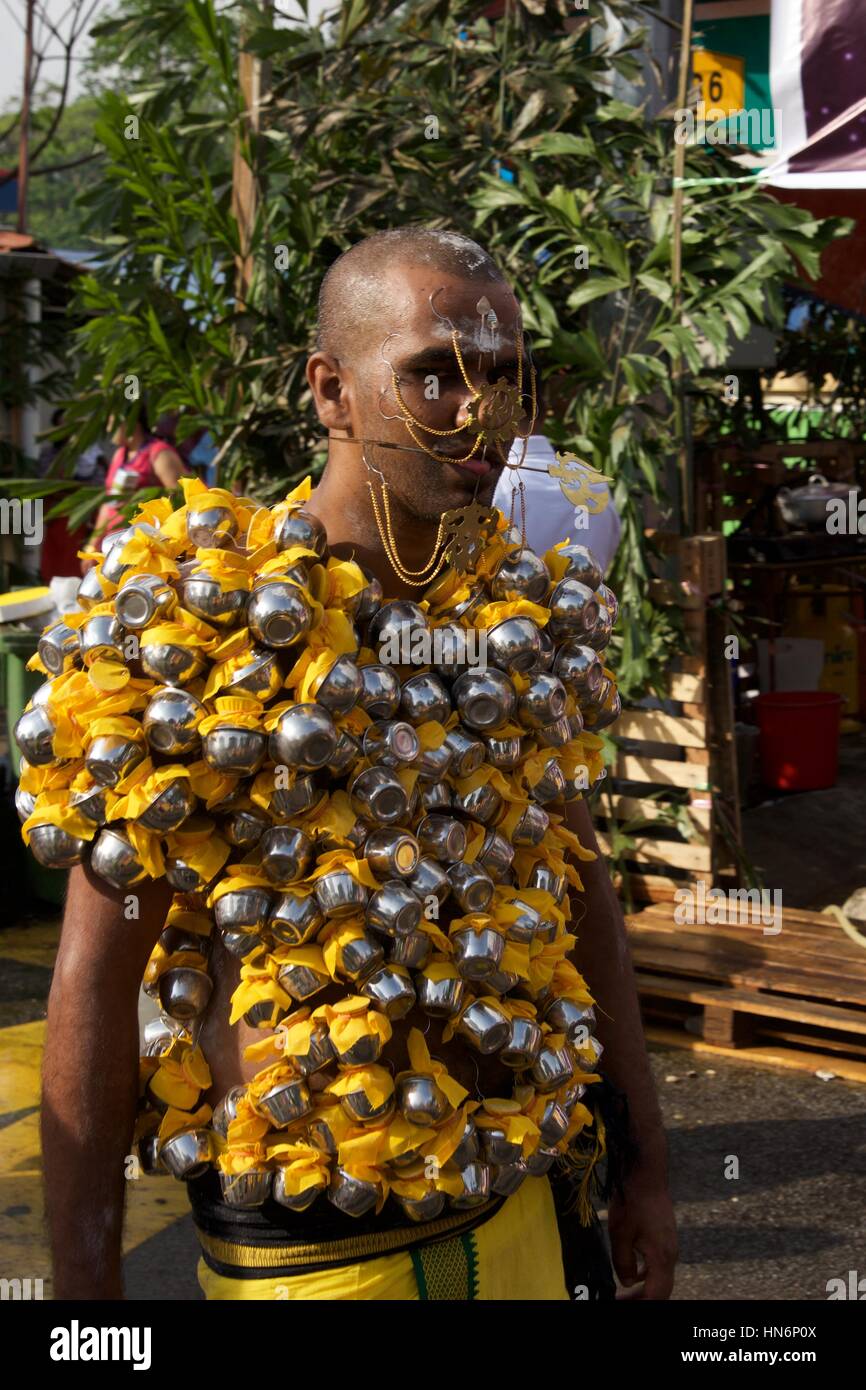 A devotee performing kavadi attam towards Lord Murugan, God of War in ...