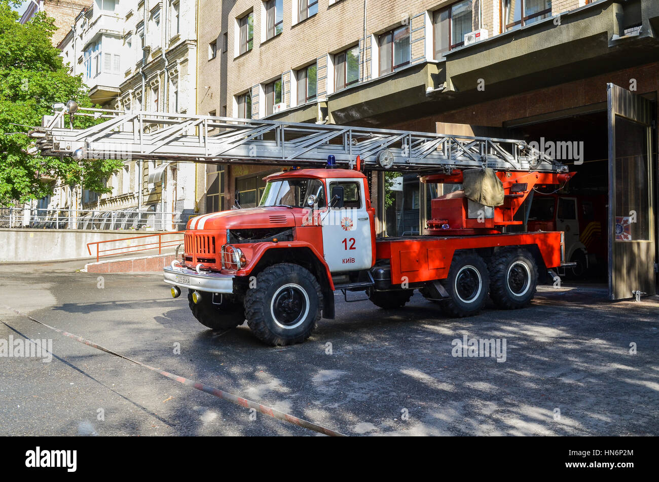Kiev, Ukraine - May 25, 2013: Ukrainian firetruck driving from station ...