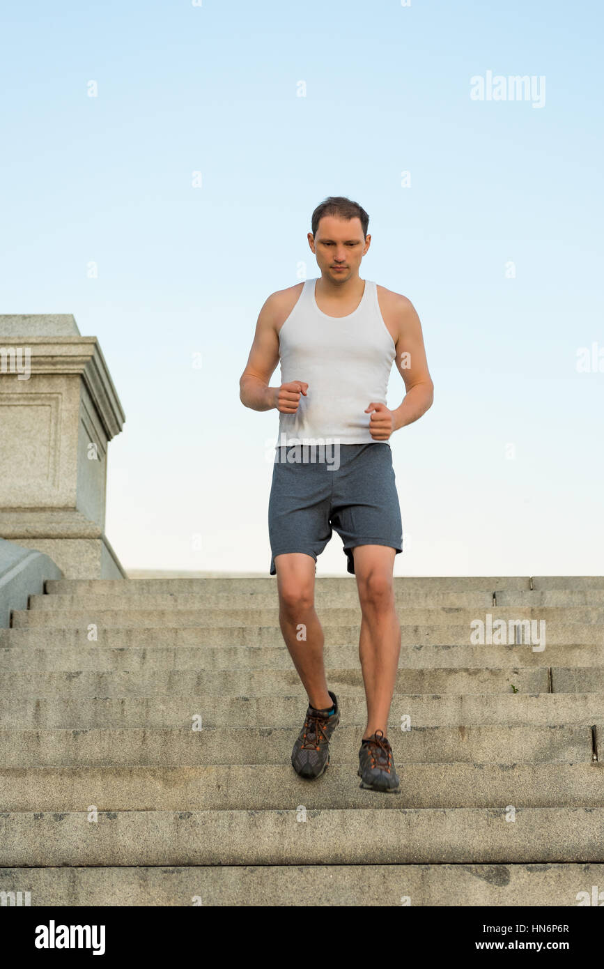 Running down steps hi-res stock photography and images - Alamy