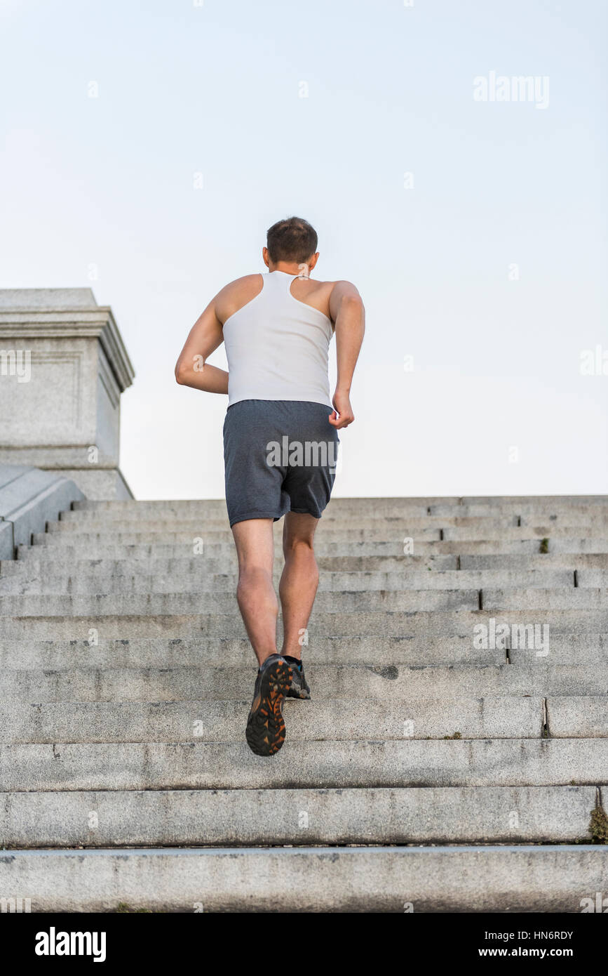 Man running up stairs hi-res stock photography and images - Alamy