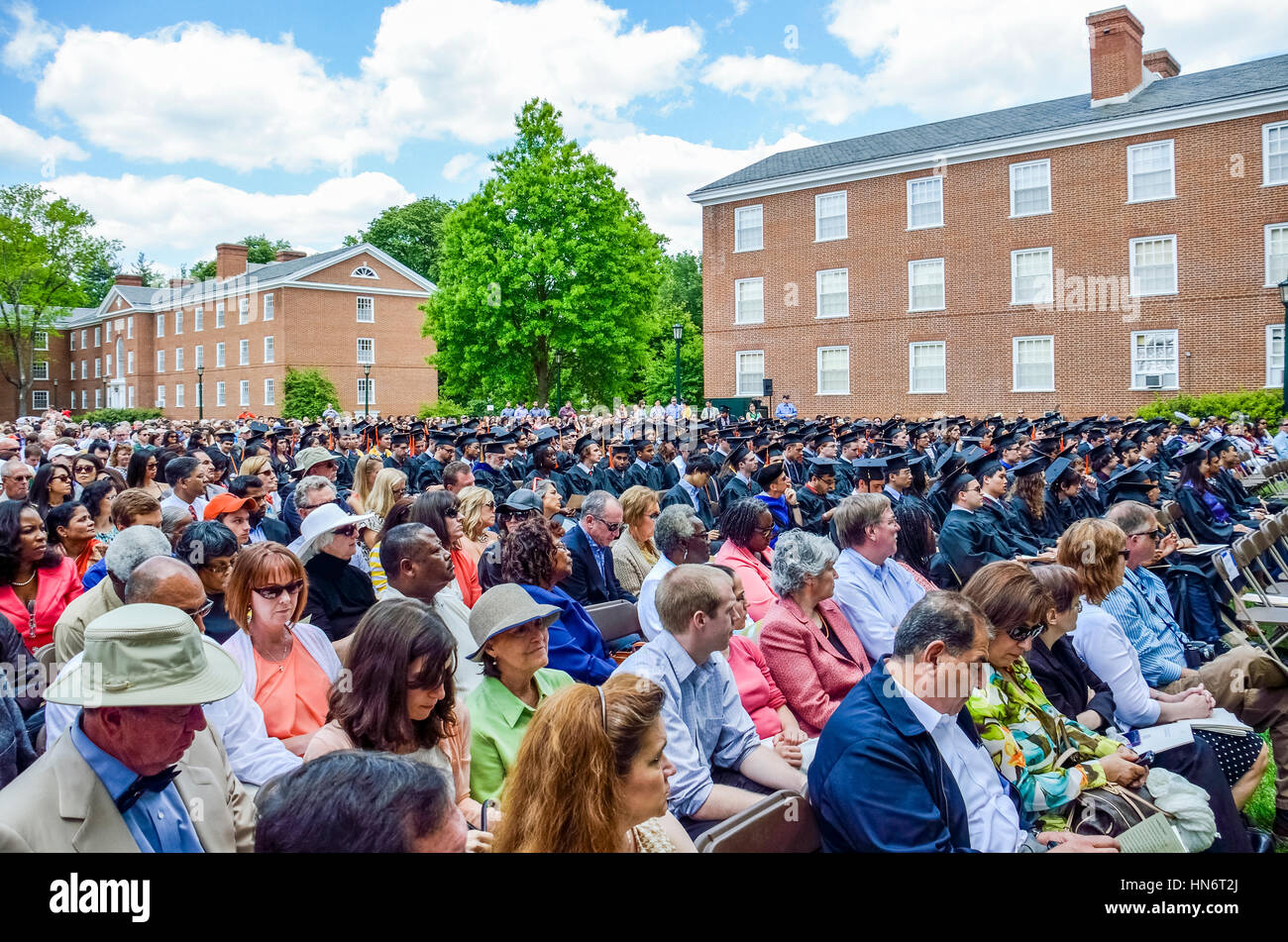 Charlottesville, USA - May 18, 2014: Crowd of people sitting on chairs ...