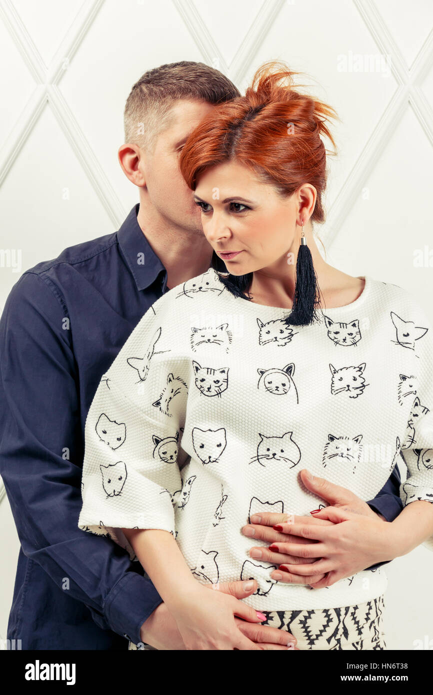 Beautiful loving couple in elegant clothes. Studio photo Stock Photo ...