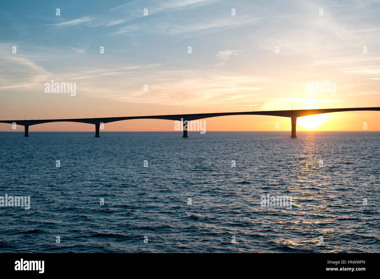 Panoramic view of the Confederation Bridge over sunset sky ...