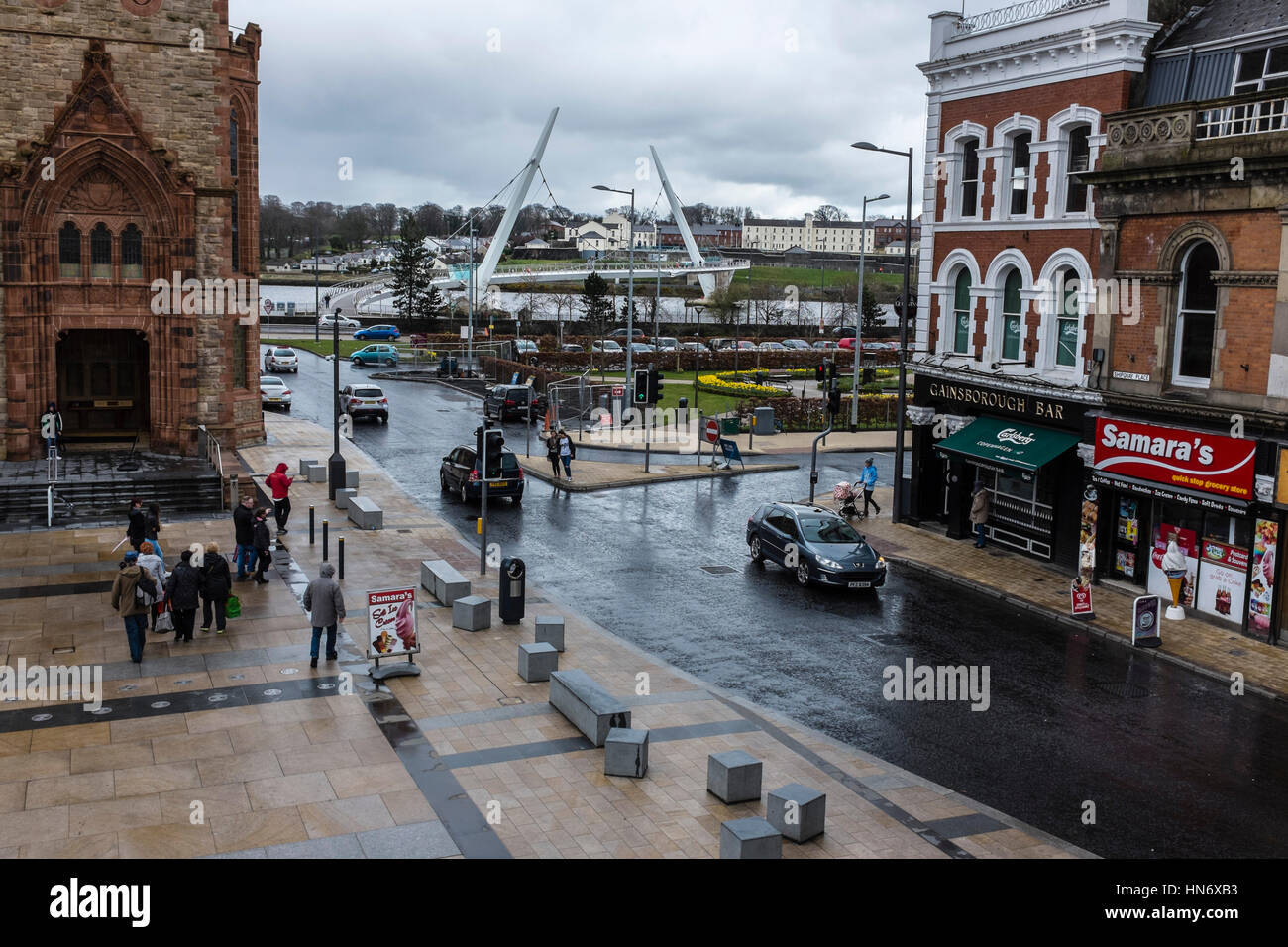 City of Derry, in Northern Ireland. View of Guildhall and Peace Bridge ...