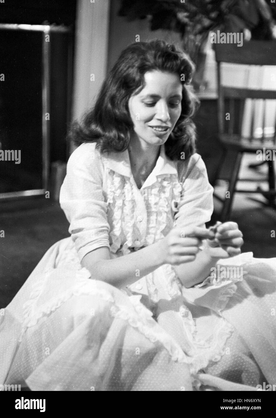 June Carter, photographed at home in 1956. The location is somewhat ...