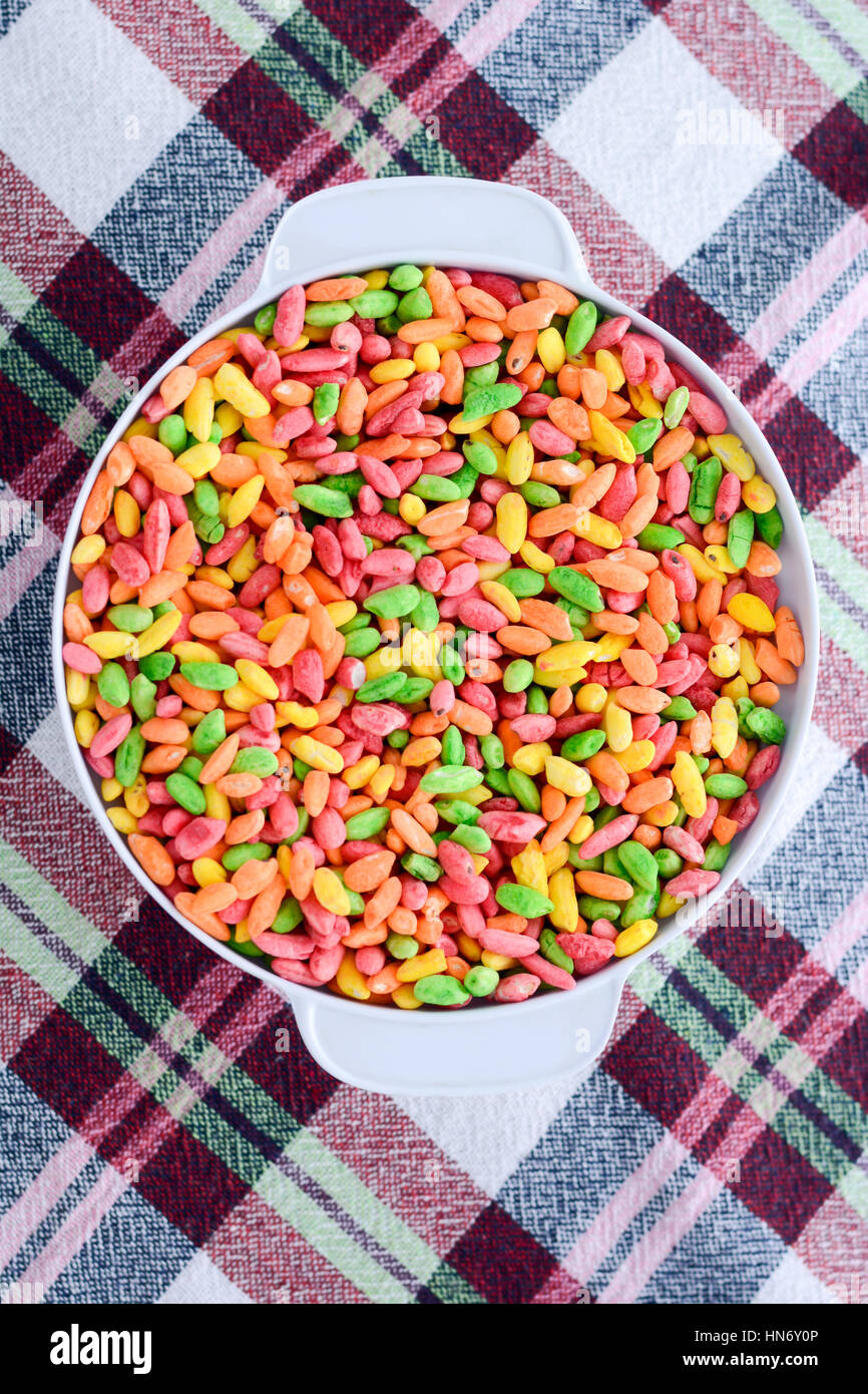 Puffed crispy colorful rice in the bowl. Healthy breakfast Stock Photo ...