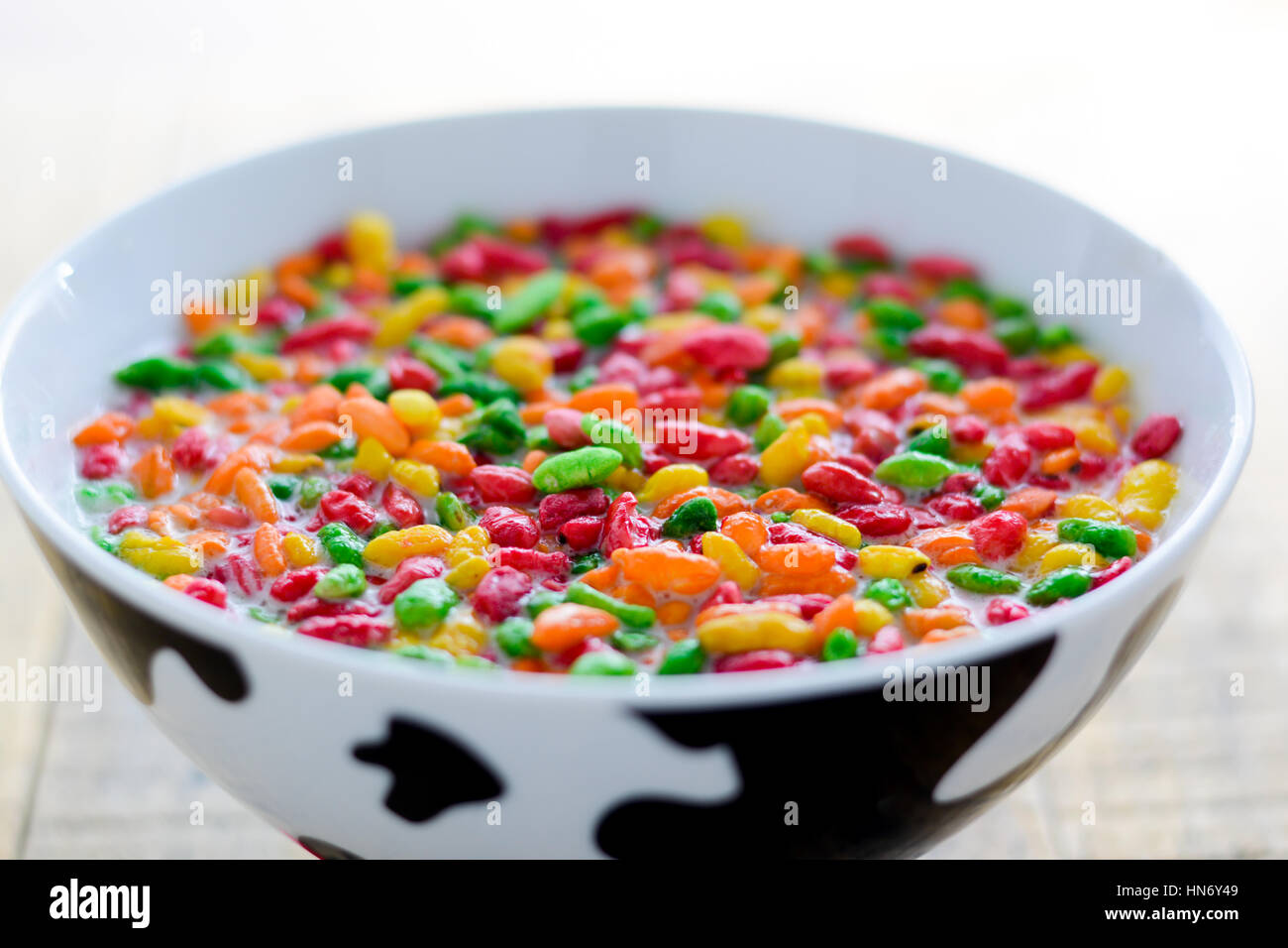 Prepared breakfast with milk and colorful puffed rice Stock Photo - Alamy