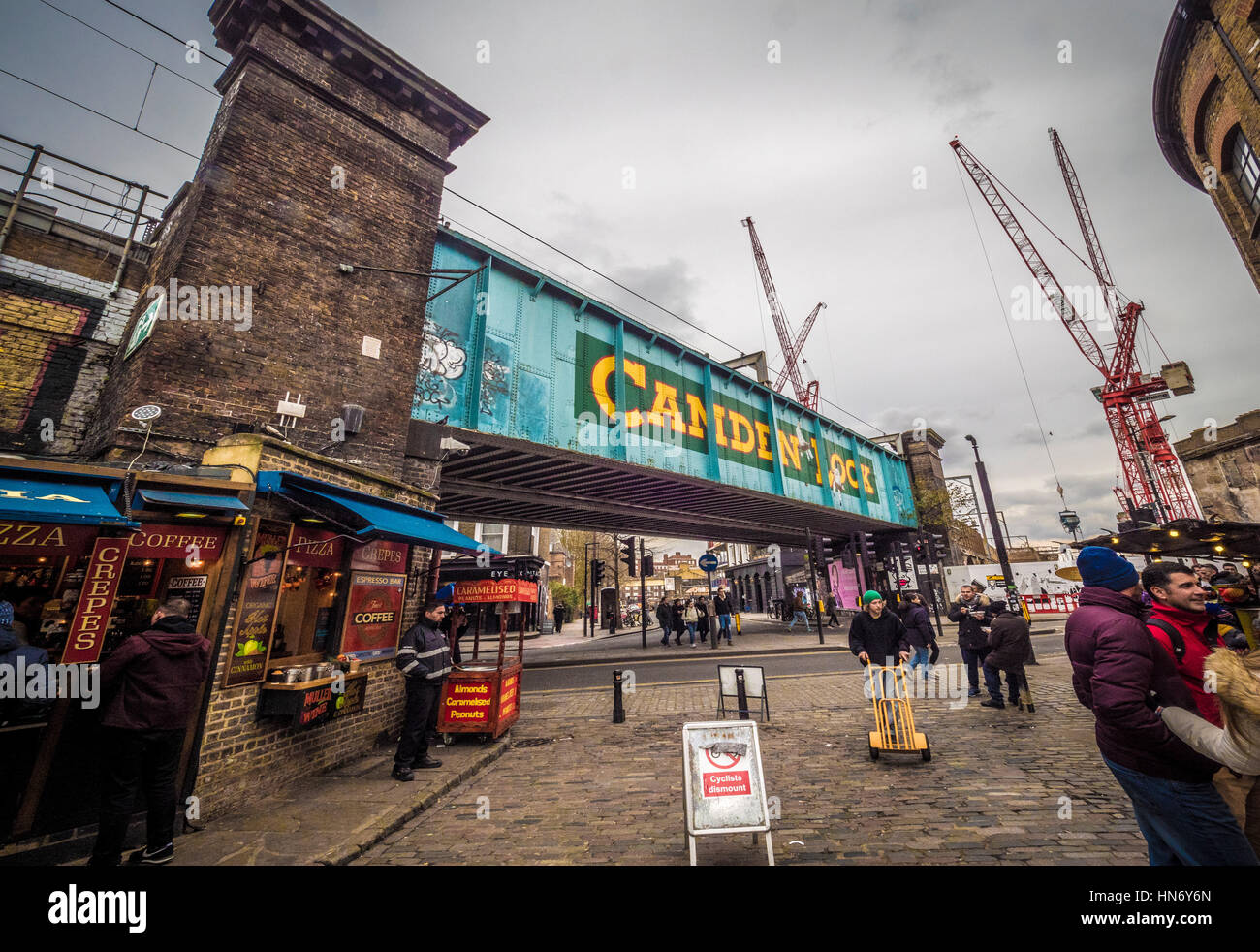 Iconic painted Camden Lock sign on side of railway bridge, London, UK ...