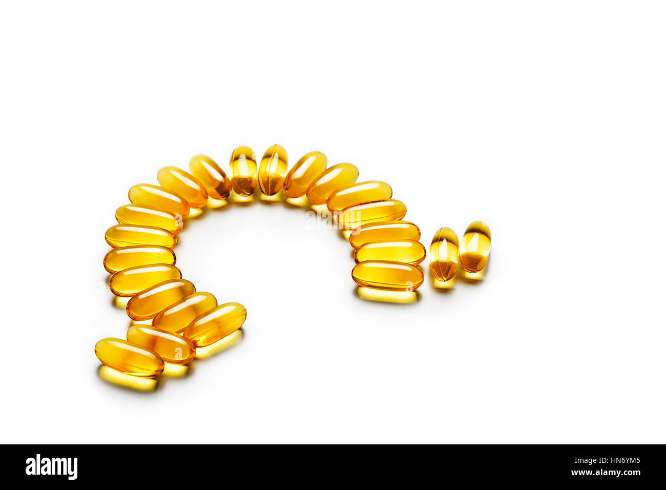 Omega-3 capsules - letter shape, isolated on white background. High ...