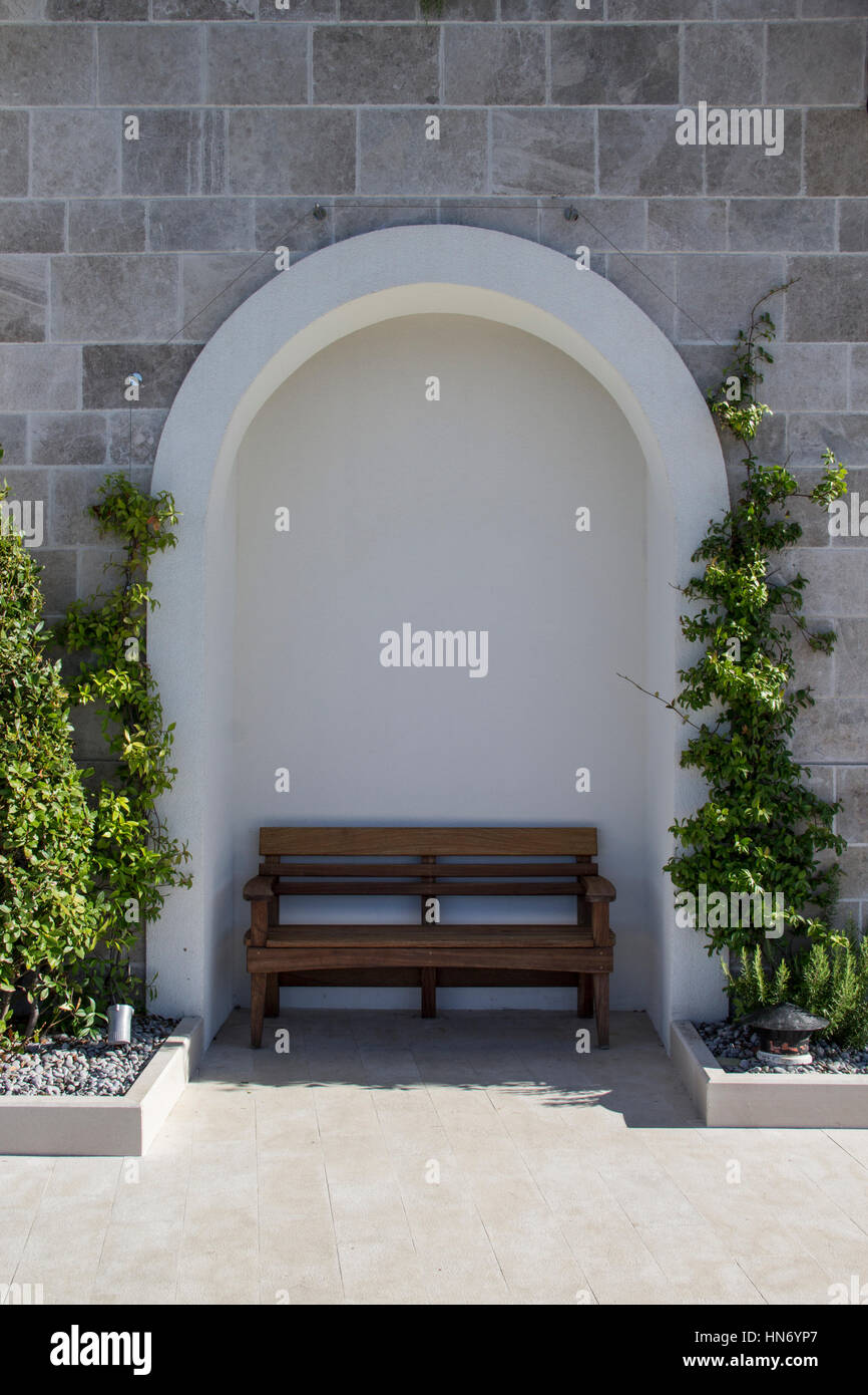 Arch with bench Stock Photo - Alamy