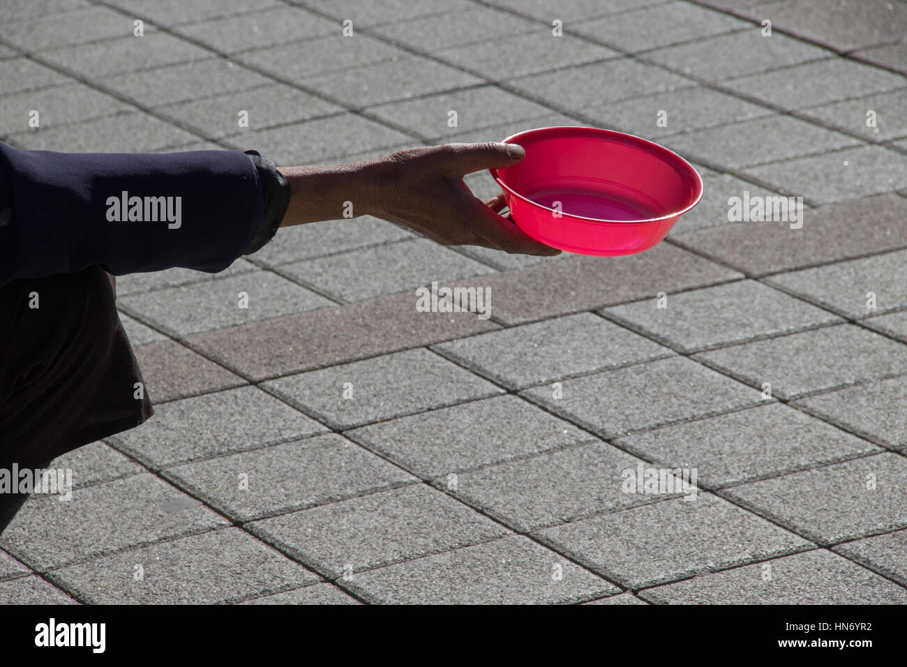 Hand begging hi-res stock photography and images - Alamy