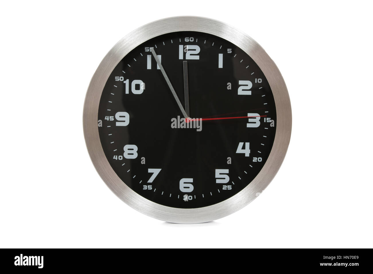 Watch showing time on wall Cut Out Stock Images & Pictures - Alamy