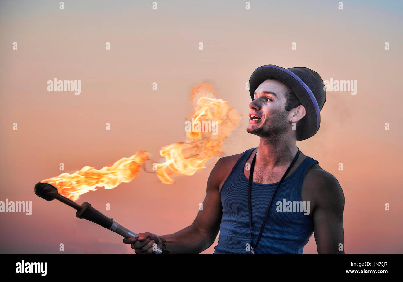 Fire eating street performer at dusk in Key West in Florida Stock Photo ...