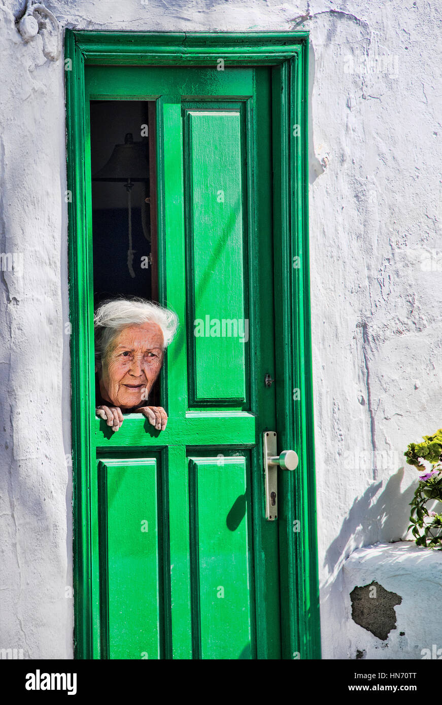 Lady at door hi-res stock photography and images - Alamy