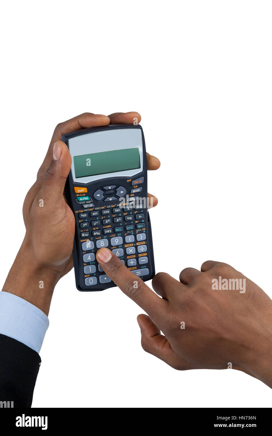 Hand of businessman using calculator against white background Stock ...