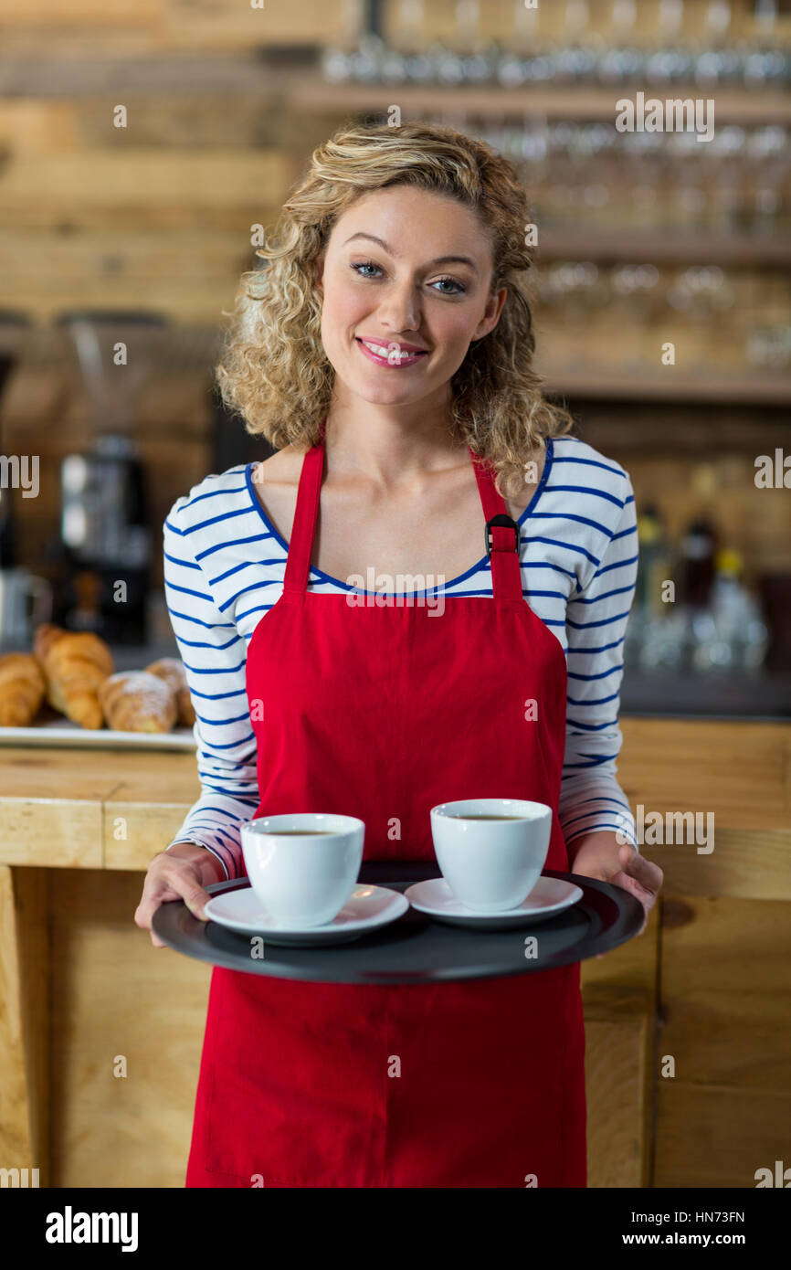 Pretty blonde waitress serving hi-res stock photography and images - Alamy