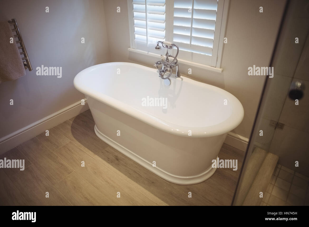 Empty bathtub in bathroom at home Stock Photo - Alamy
