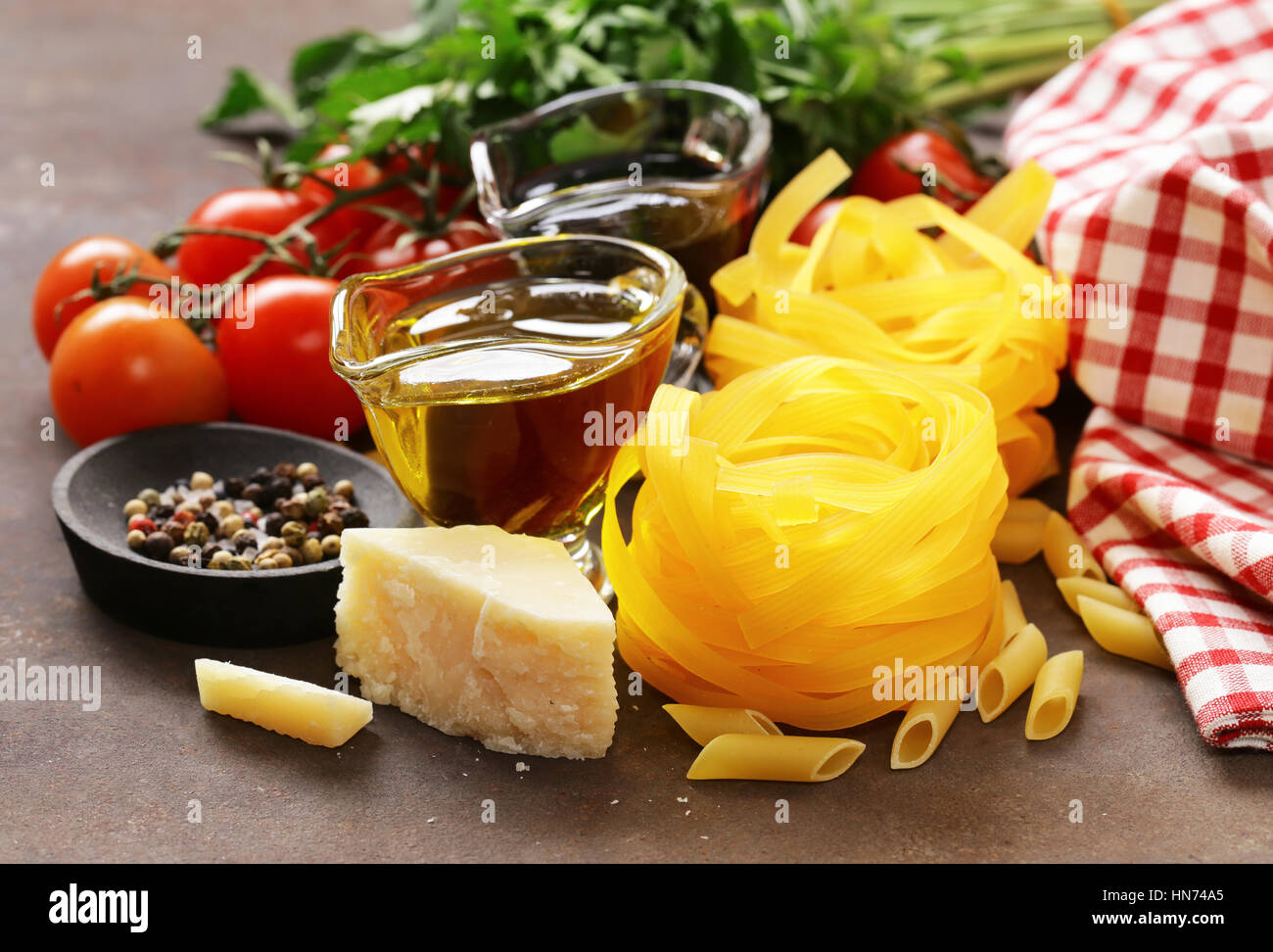 Italian food ingredients - vegetables, olive oil, spices and pasta ...