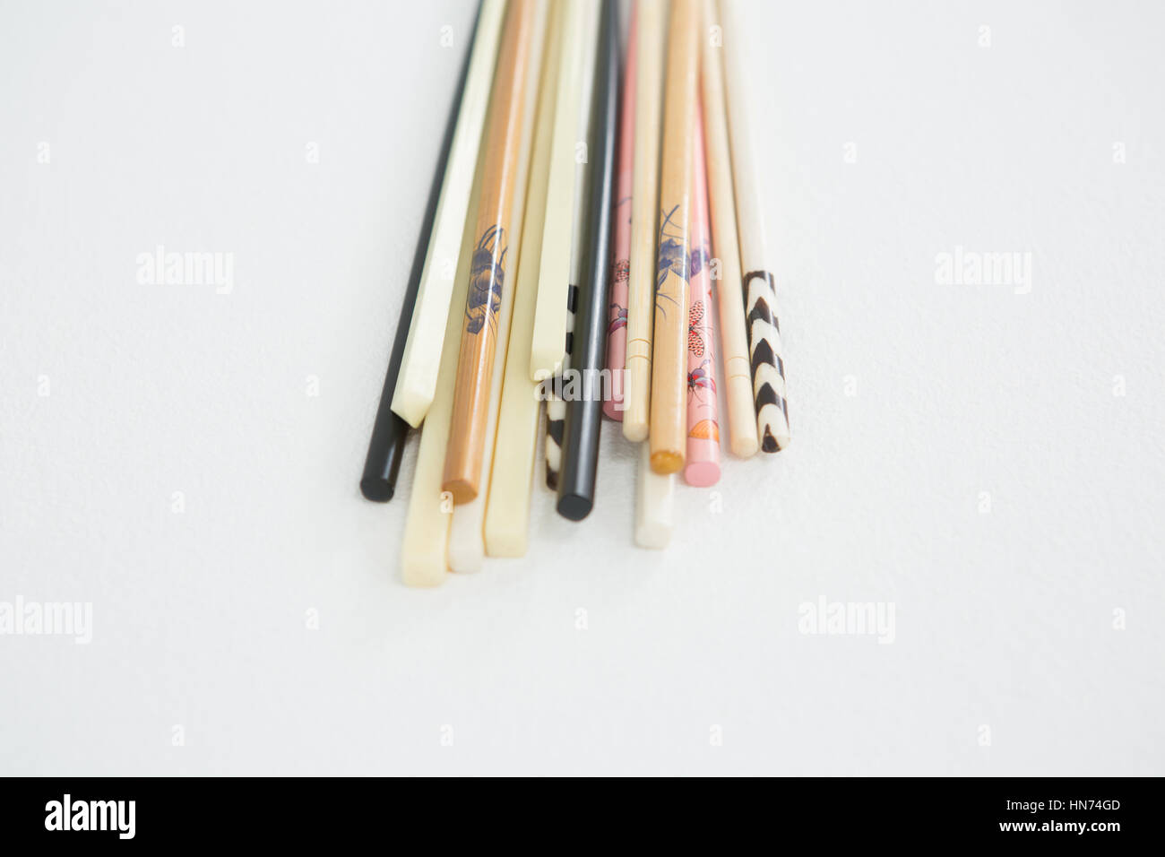 Variety of chopstick on white background Stock Photo - Alamy