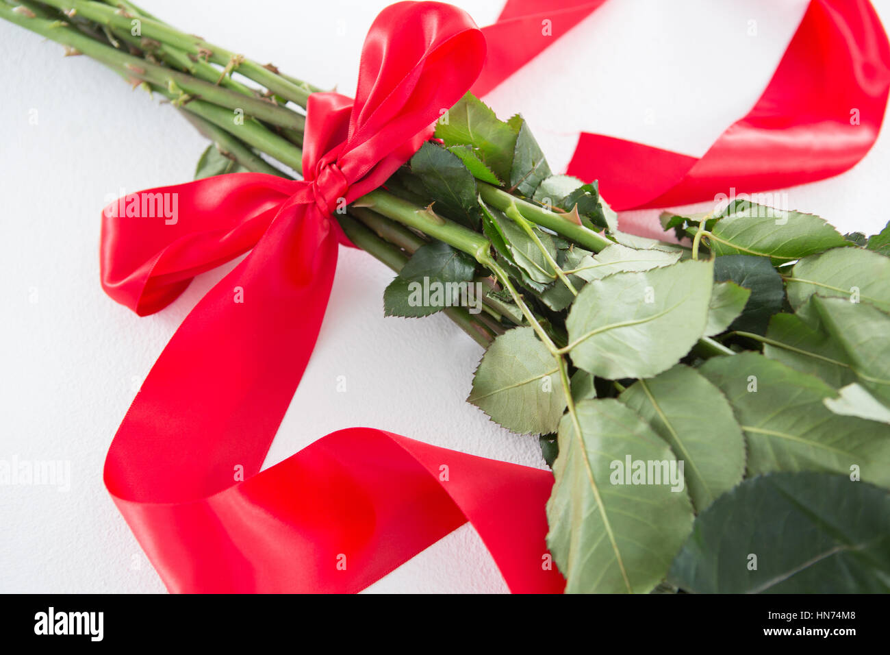 Bunch of red roses on white background Stock Photo - Alamy