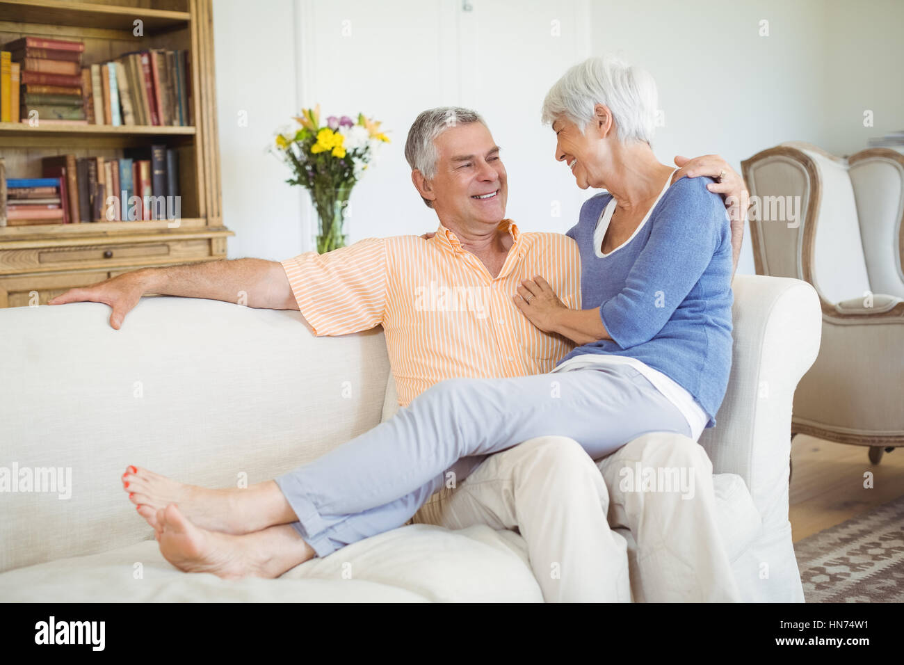 Woman sitting on mans lap hi-res stock photography and images - Alamy