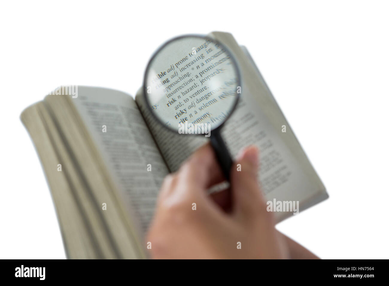 Hand holding magnifying glass reading hi-res stock photography and ...