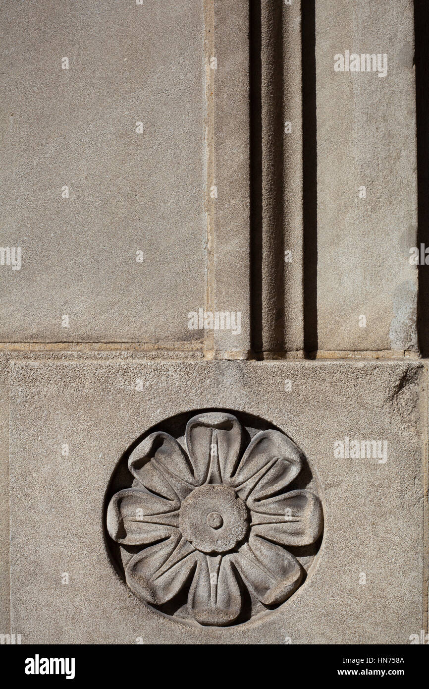 Closeup of carved rosette on exterior stone wall Stock Photo - Alamy