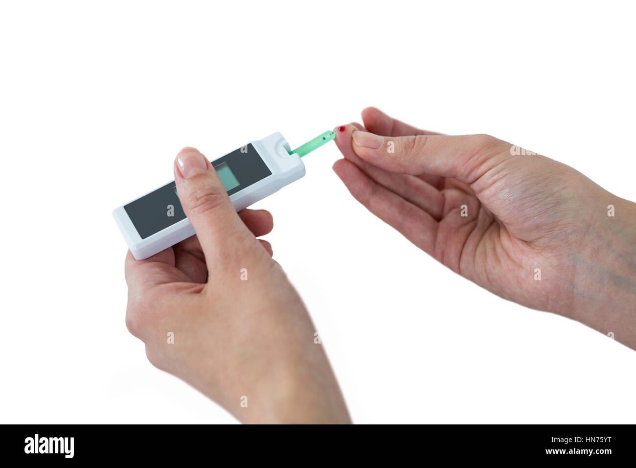 Close-up of woman hands testing blood sugar with glucometer against ...