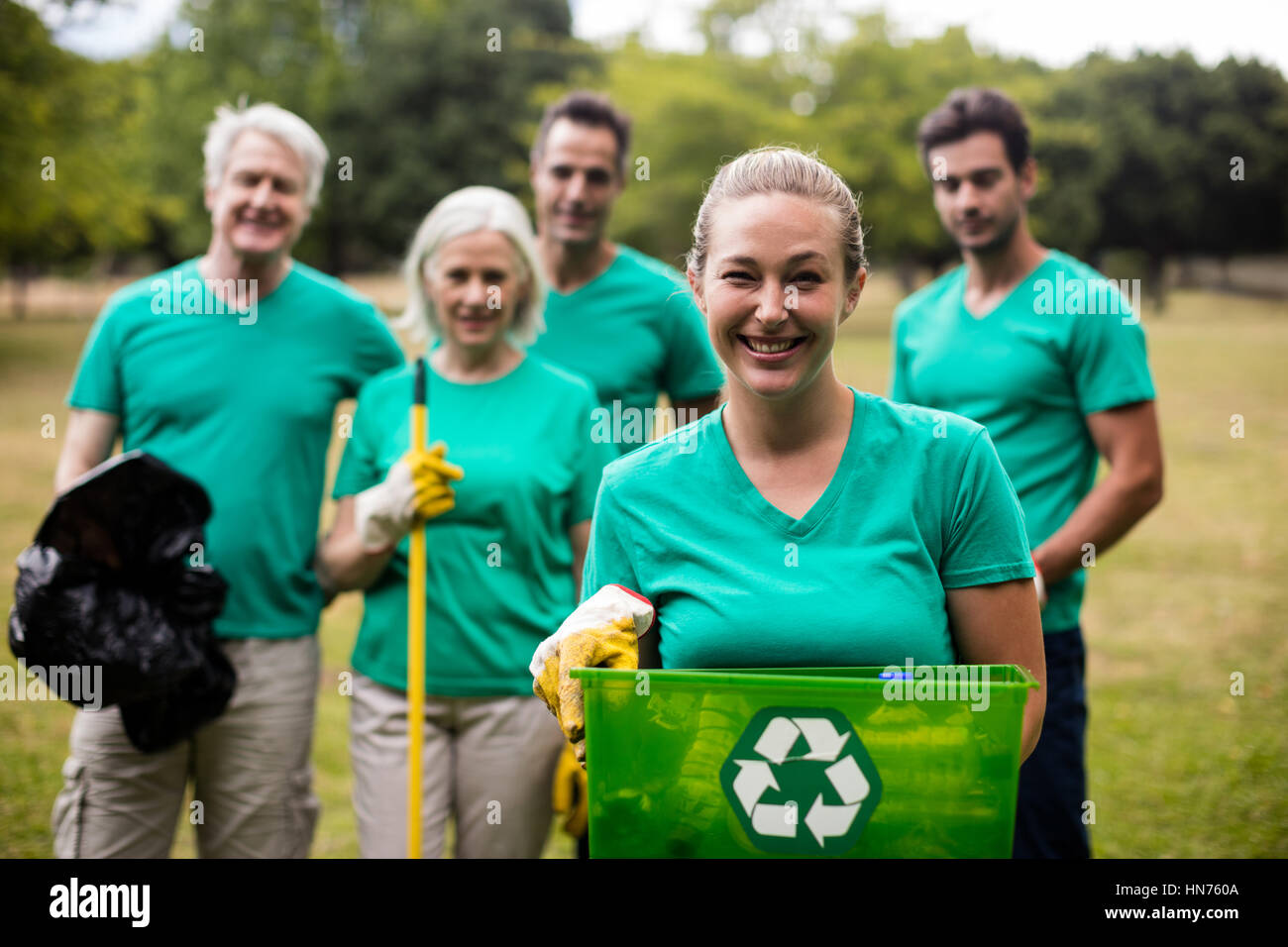 Team members volunteer hi-res stock photography and images - Alamy