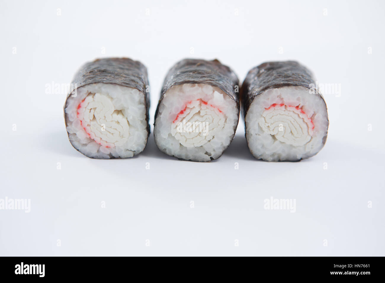 Close-up of maki sushi on white background Stock Photo - Alamy