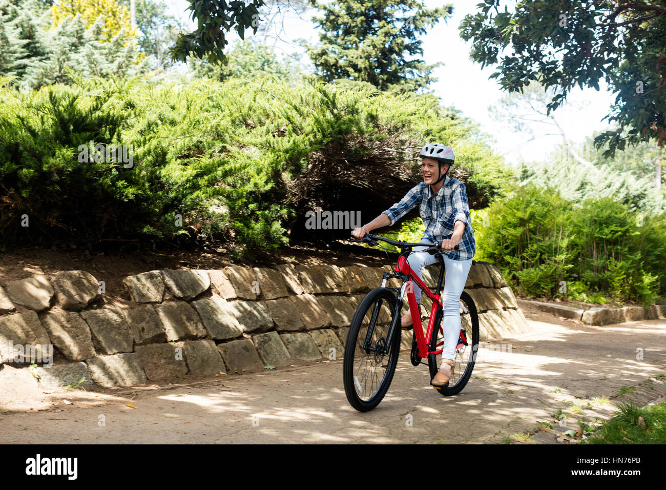 Cycling in park hi-res stock photography and images - Alamy