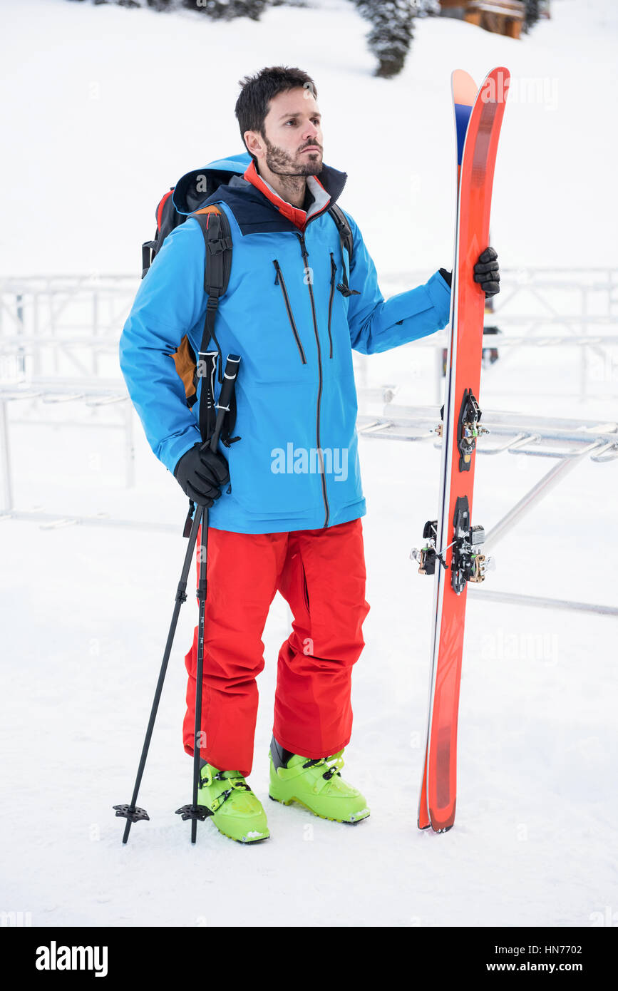 Male skier standing on slope hi-res stock photography and images - Alamy