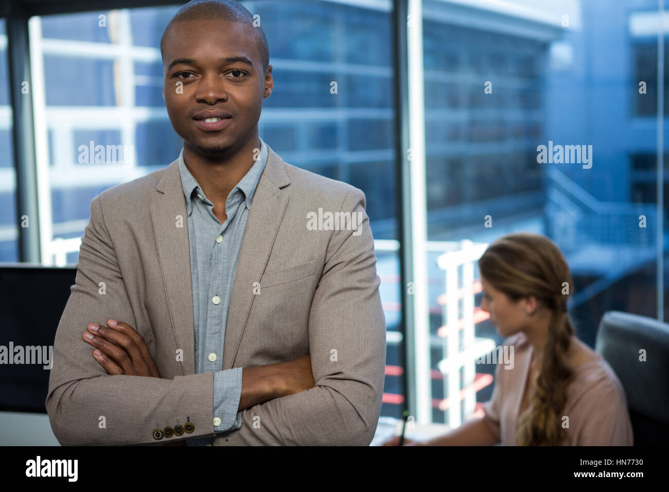 Portrait of a confident business executive standing in office Stock ...