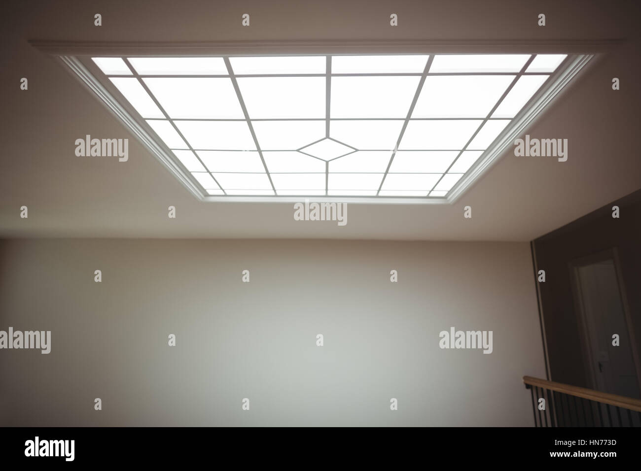 Interior of home with modern glass ceiling Stock Photo - Alamy