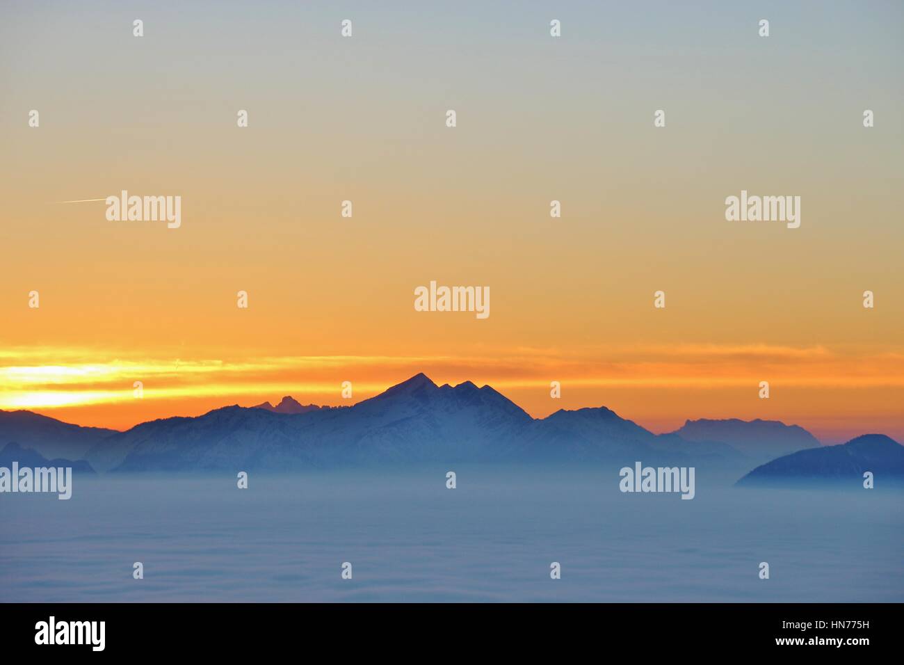View of the alps at sunset, in winter. Seen from the top of the ...