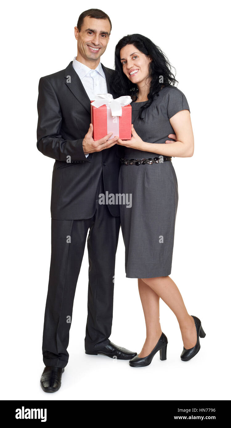 romantic couple with gift box, people dressed in black suit, man gives ...