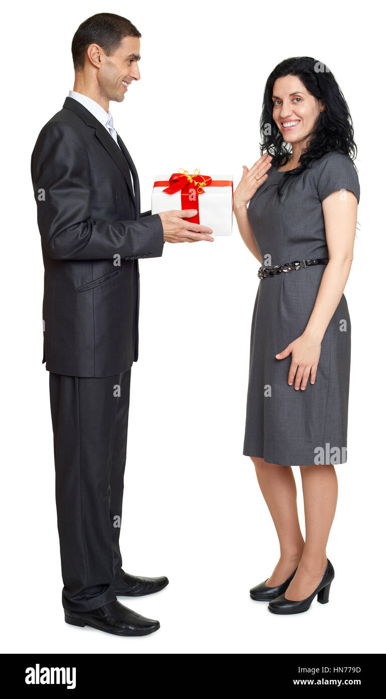 romantic couple with gift box, people dressed in black suit, man gives ...