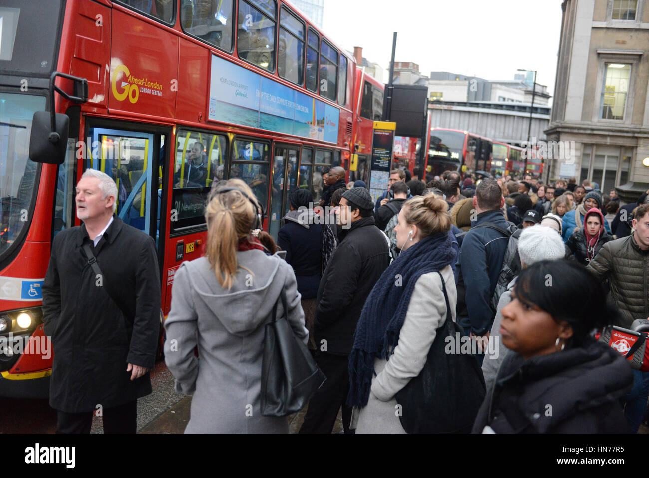 Commuters queue at London Bridge for buses as the tube station is ...