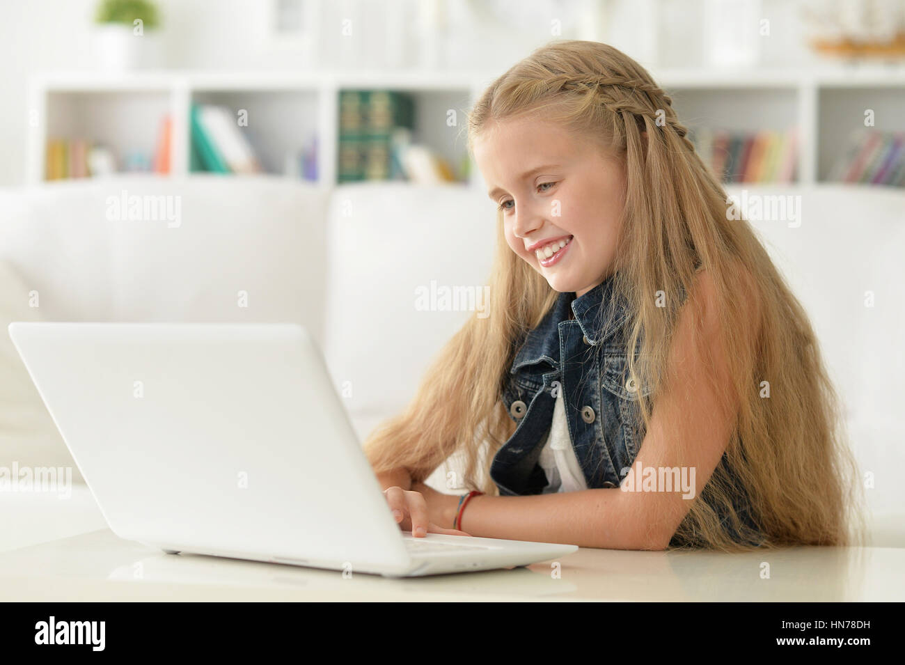 cute little girl using laptop Stock Photo - Alamy