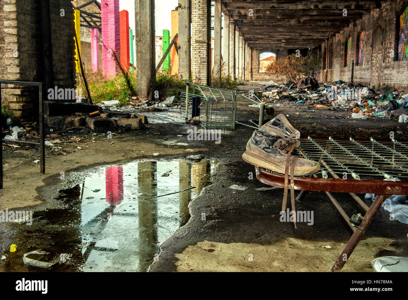 Garbage and decay around the aisle of the soap factory Mira Lanza where ...