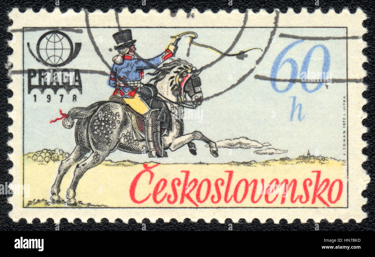 A postage stamp printed in Czechoslovakia shows a Rider with a whip ...