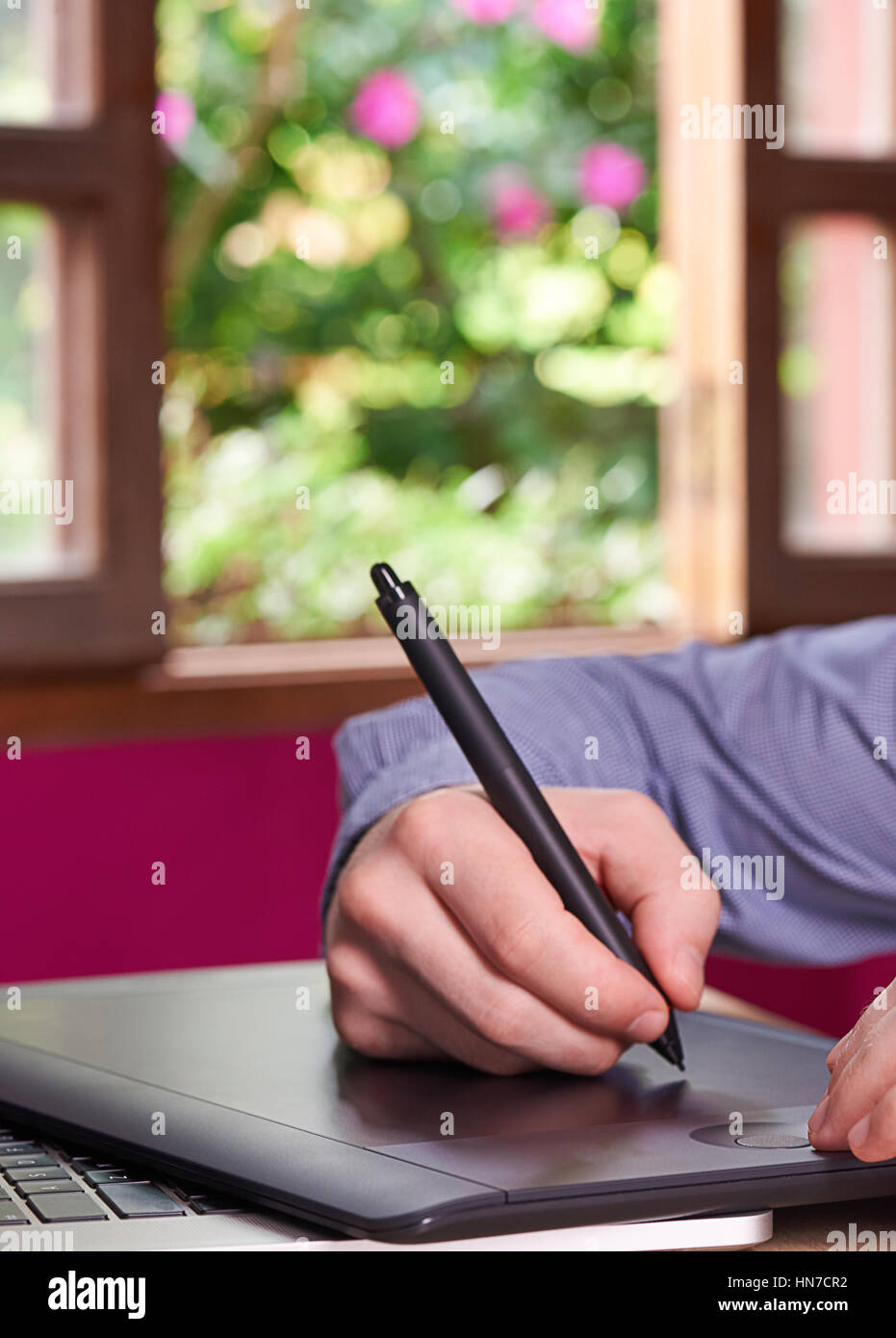 Designer using graphic tablet office hi-res stock photography and ...