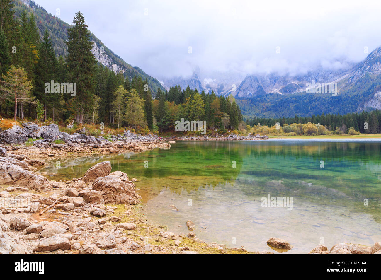 Beautiful Lago di Fusine the mountain lake and Mangart mountain in the ...