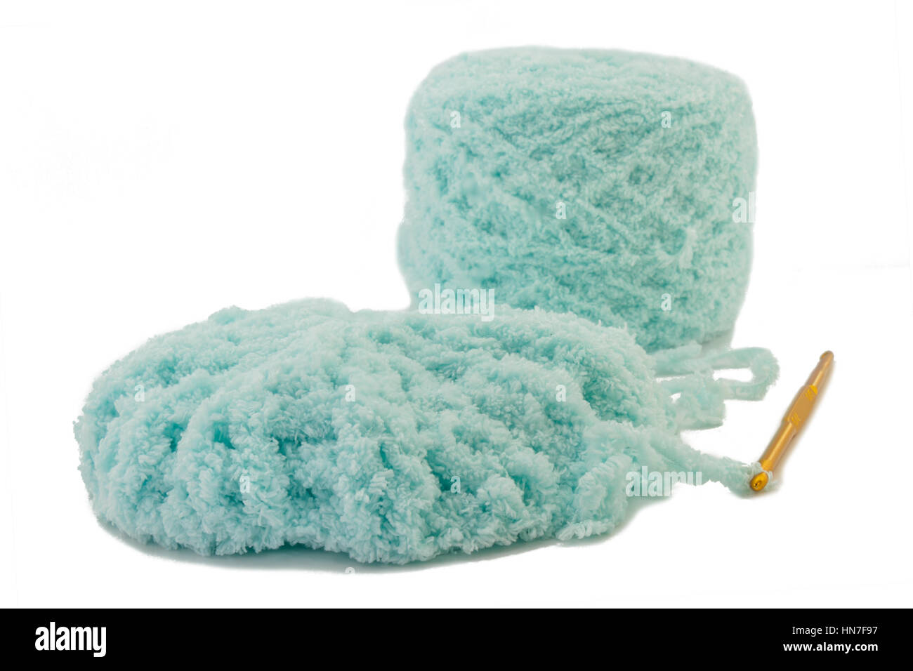 Color green knitting wool isolate on white background Stock Photo - Alamy