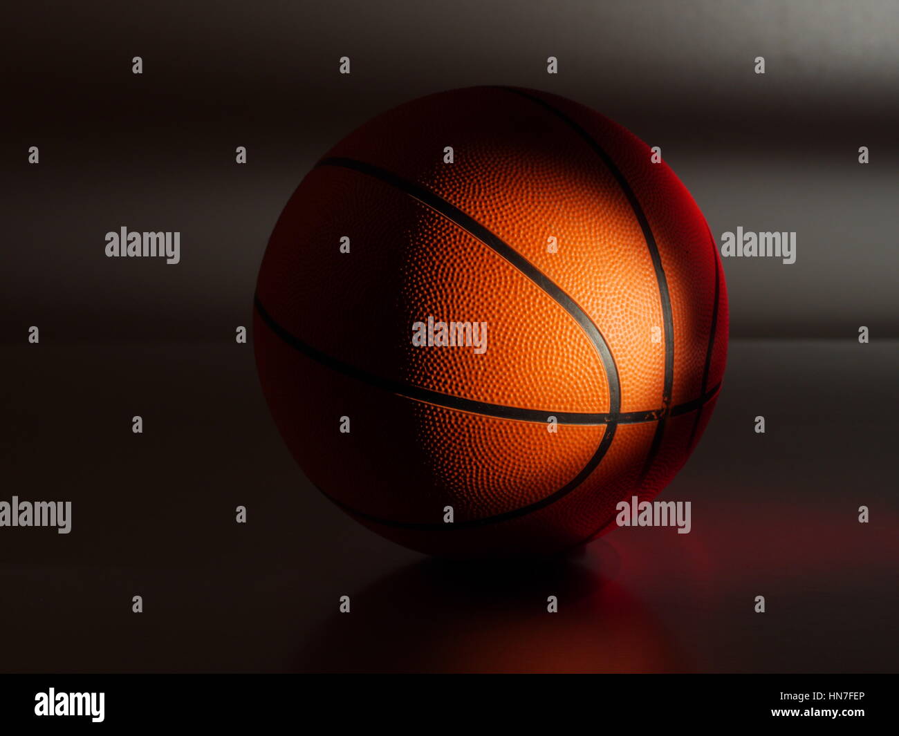 basketball in dramatic lighting with spot light Stock Photo - Alamy