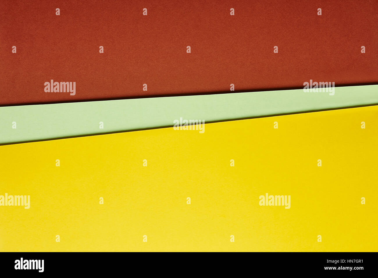 Colored cardboards background in brown green yellow tone. Copy space ...