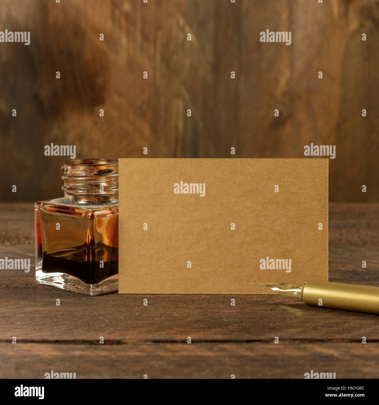 Thick cardboard business card with ink pen and copyspace Stock Photo ...